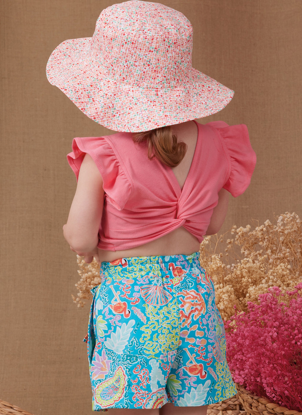 Simplicity S9961 Toddlers' Shorts, Pants, Hat and Knit Top Worn Front ...